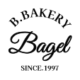 The name of a bakery shop with black cursive and cursive English text ...